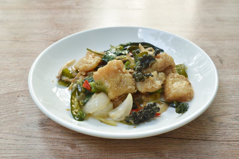 Deep Fried Slice Striped Snake Head Fish with Pepper and Finger Root on ...