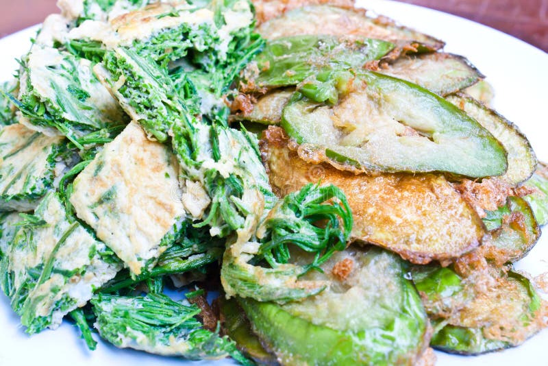 Deep Fried Snake Eggplants Coated with Egg Stock Photo - Image of melon ...