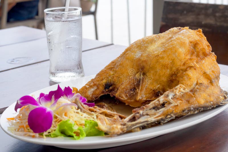 Deep Fried Snapper Topped with Sweet Fish Sauce Stock Photo - Image of ...