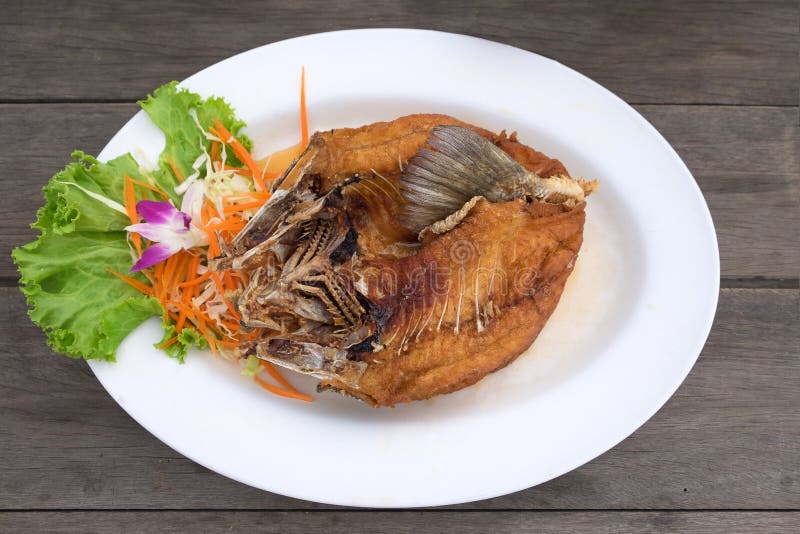 Deep Fried Snapper Topped with Sweet Fish Sauce Stock Photo - Image of ...