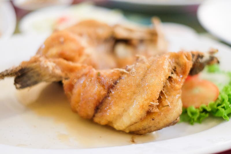 Deep Fried Snapper Topped with Sweet Fish Sauce and Vegetable Se Stock ...
