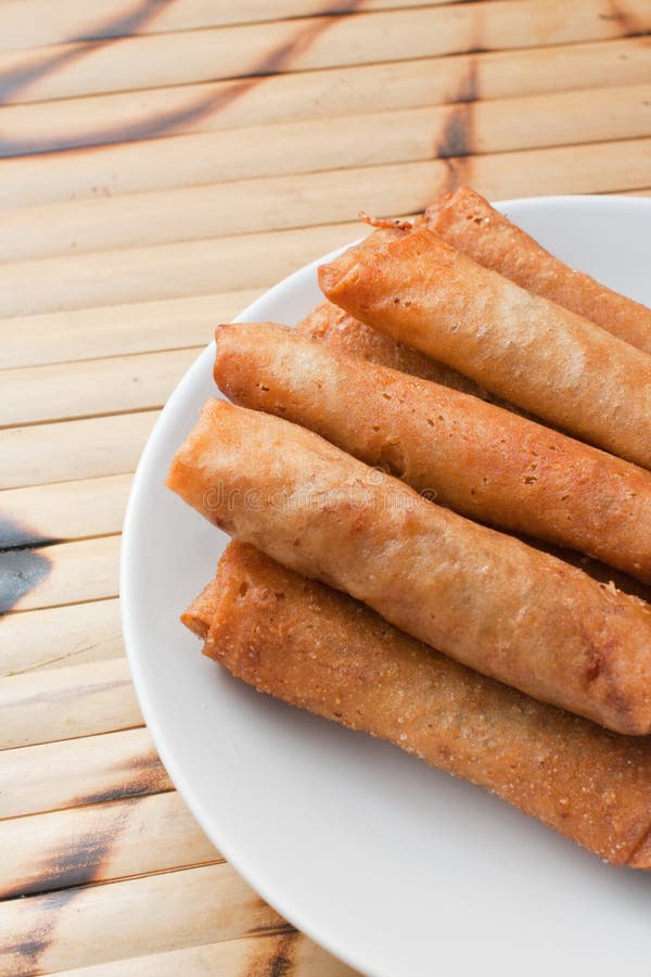 Deep fried spring rolls stock photo. Image of wood, bamboo - 24108384