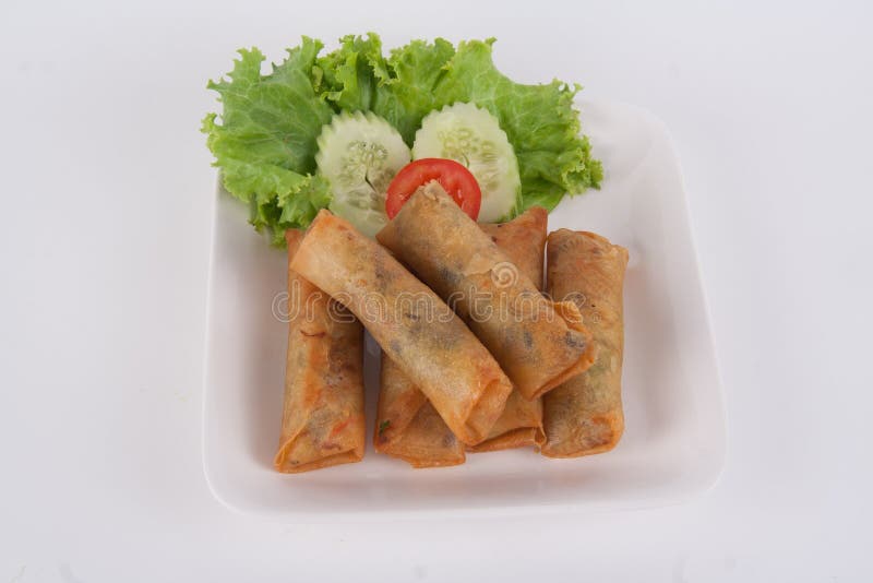 Deep Fried Spring Rolls on White Dish Stock Photo - Image of carrot ...