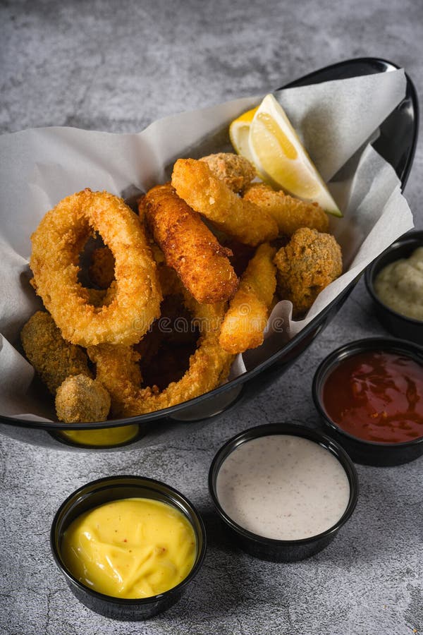 Deep Fried Squid, Shrimp and Mussels with Sauces on the Side Stock ...