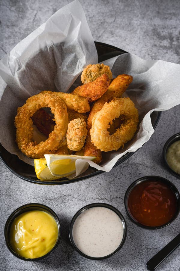 Deep Fried Squid, Shrimp and Mussels with Sauces on the Side Stock ...
