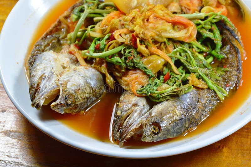 Deep Fried Striped Snake Head Fish in Mixed Hot and Sour Soup on Dish ...