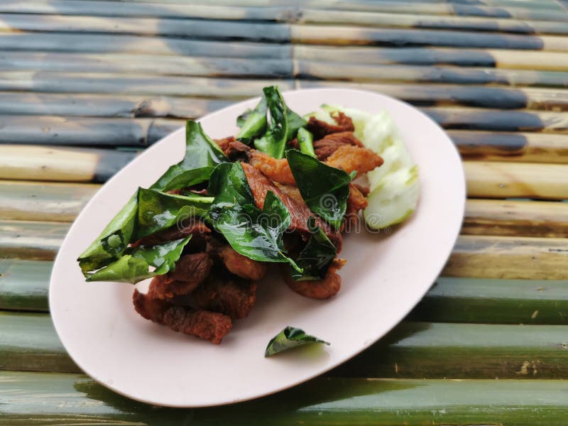 Deep Fried Sun-dried Pork with Herb and Vegetable Stock Photo - Image ...