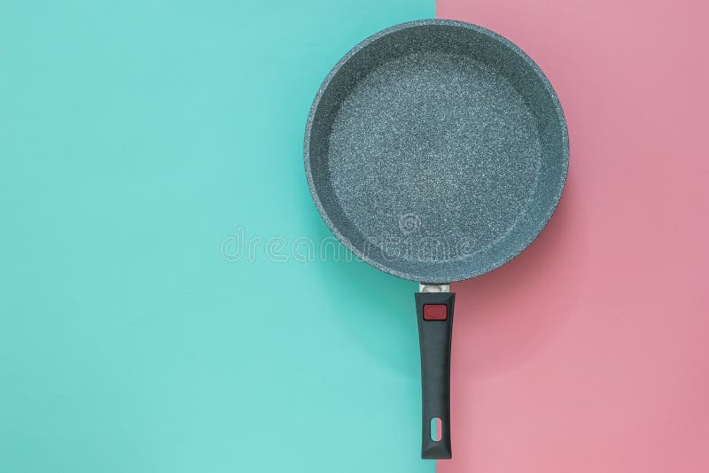 Deep Frying Pan with Removable Handle on Red and Blue Background. Stock ...
