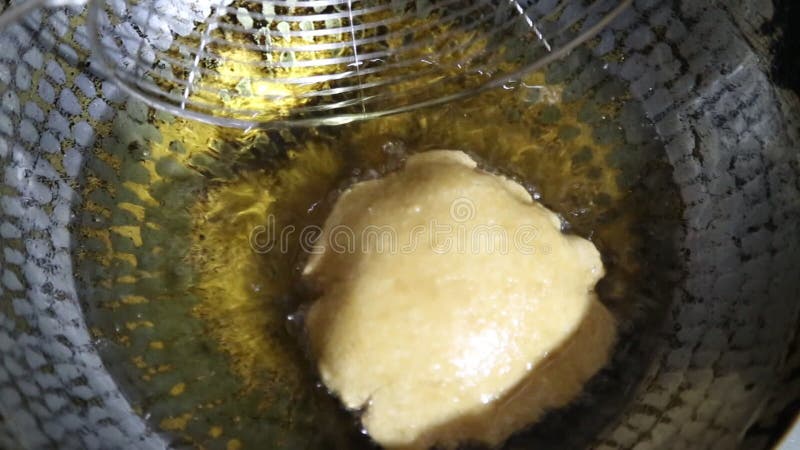 Deep Frying Puri Poori Recipe in Indian Kitchen Stock Footage - Video ...