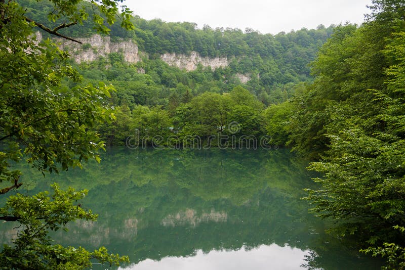 Deep green lake stock image. Image of outdoors, blue - 31895439