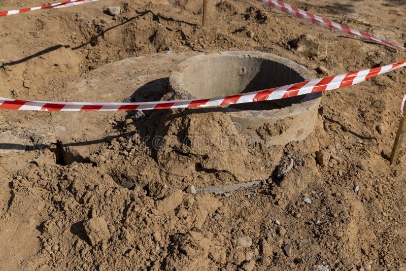 A Deep Hole in the Ground on the Site of Which a Highway Was Started ...