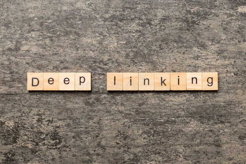 Deep Linking Word Written on Wood Block. Deep Linking Text on Cement ...