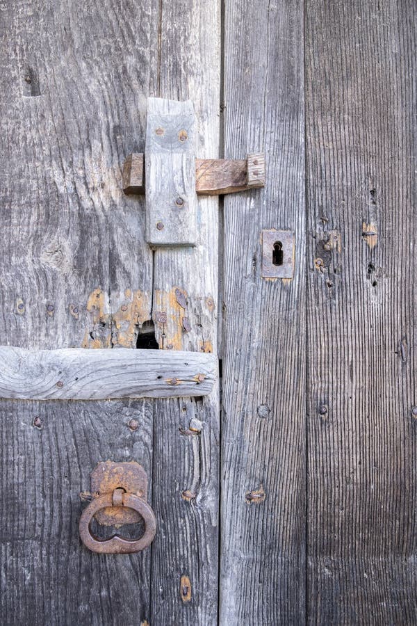 Deep Old and Weathered Door with Traditional Locking System, Vertical ...