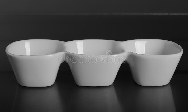 Deep Porcelain Bowl with Three Compartments. Front View Stock Photo ...
