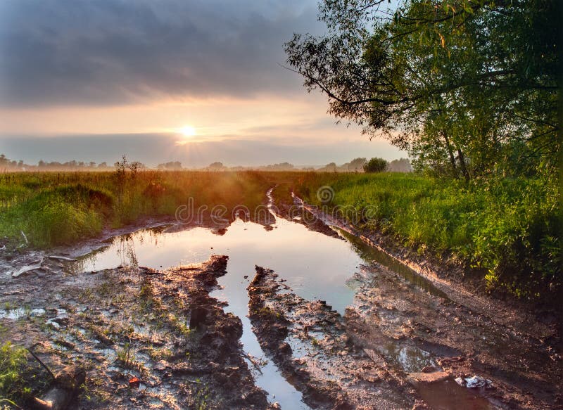 Deep puddle on a road stock photo. Image of dirty, puddle - 26084560