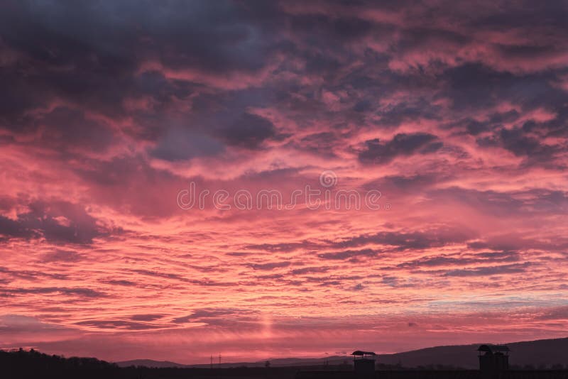 A Deep Purple Sunset with Dark Clouds in the Morning Stock Photo ...