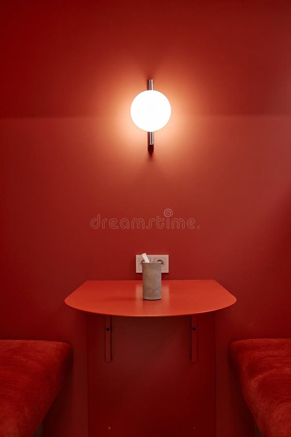 Deep Red Cafe Booth Unit with Table and Lighting Lamp on Wall Stock ...