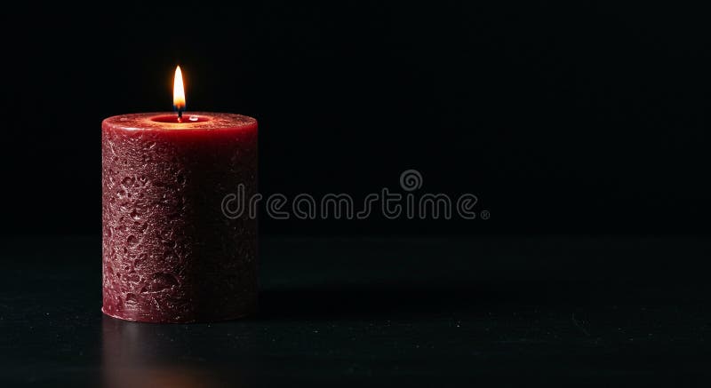 Deep Red Cylindrical Candle with a Textured Surface Stands on a Dark ...