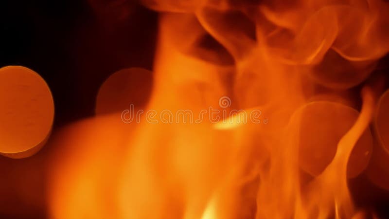 The Deep Red and Orange Hues of the Flames Represent a Buildup of ...