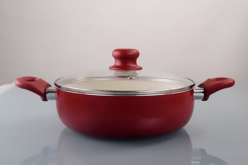 Deep red pan, front view stock image. Image of dish, domestic - 87064131