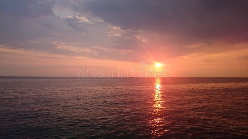 Deep red sun stock photo. Image of summer, greece, deep - 75823636