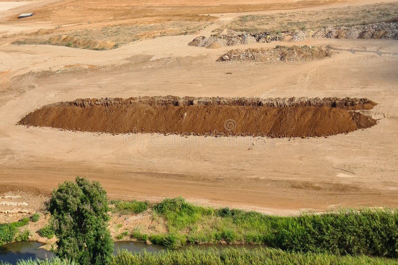 Deep Sand Pit Dug for Trash in the Field Stock Photo - Image of land ...