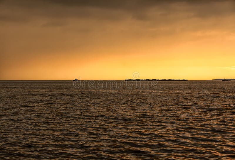 Deep sea shore in sunset stock photo. Image of outside - 48614348