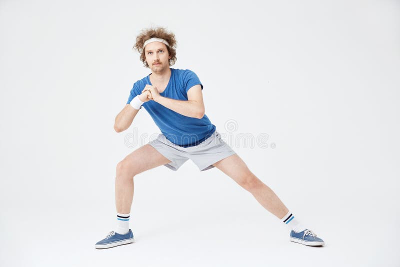 Deep Side Lunge Position. Retro Man in Old Style Clothes Stock Image ...