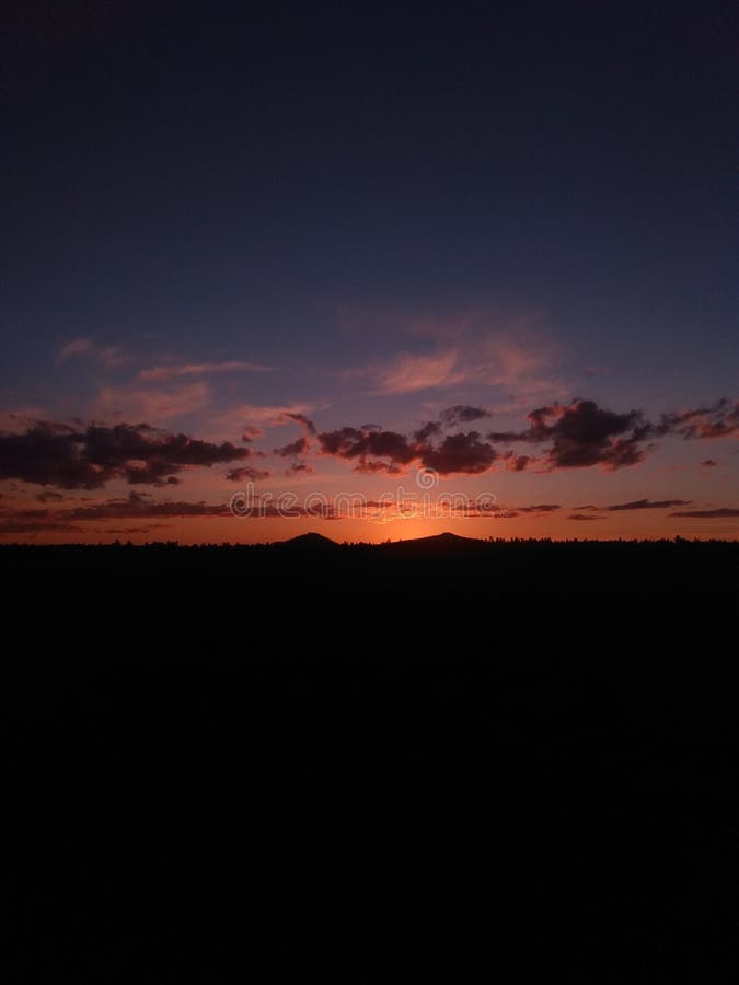 Deep sunset colors stock photo. Image of cloud, colors - 231629660