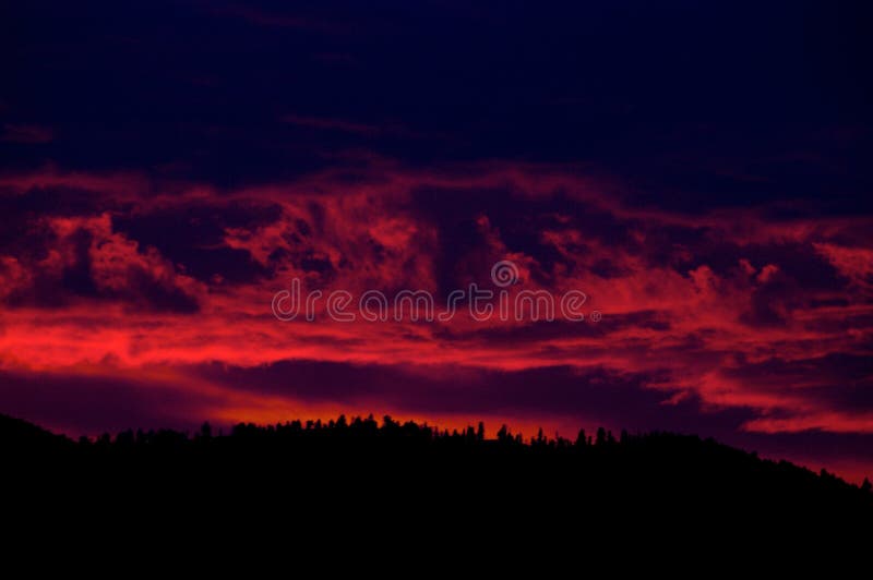 Deep Sunset Over Mountains stock image. Image of wild - 91016001