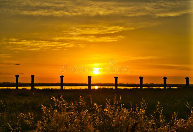 Deep sunset on wetlands stock photo. Image of orange - 118681808