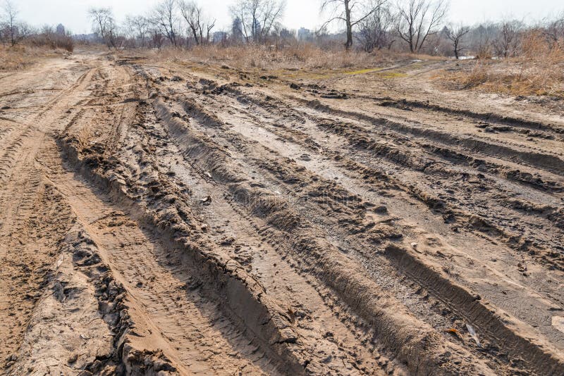 Deep Tires Tracks in the Sandy Mud Stock Image - Image of track, travel ...