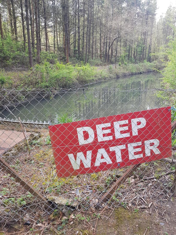 Deep Water Warning Sign Around Pond Stock Photo - Image of hazard ...