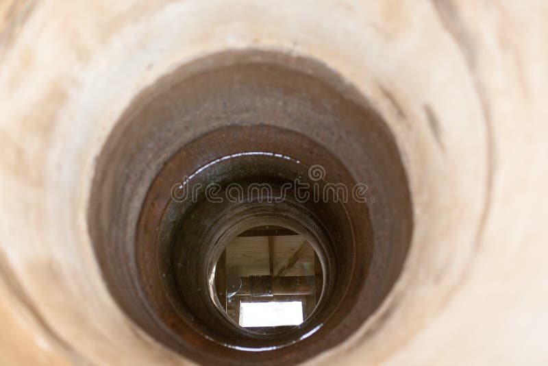 Deep Well Top Closeup View of Rings To the Bottom Stock Photo - Image ...