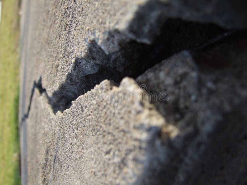 Deeply Cracked Broken Concrete and Grass Stock Photo - Image of ...