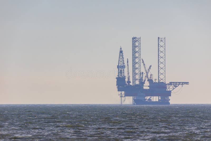 Deepwater Oil Platform on the Horizon at Sea Stock Photo - Image of ...