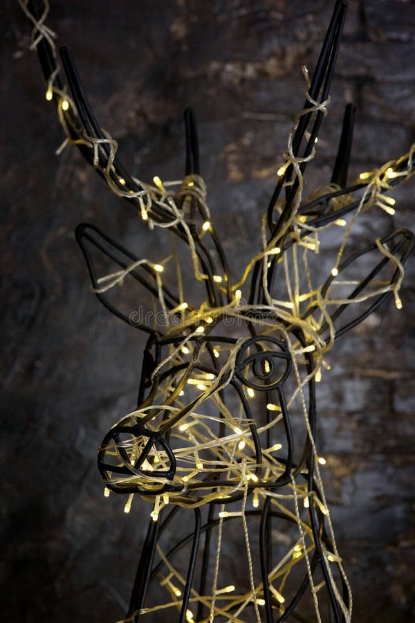 A Deer Figure Made of Wire, Decorated with a Garland Stock Image ...