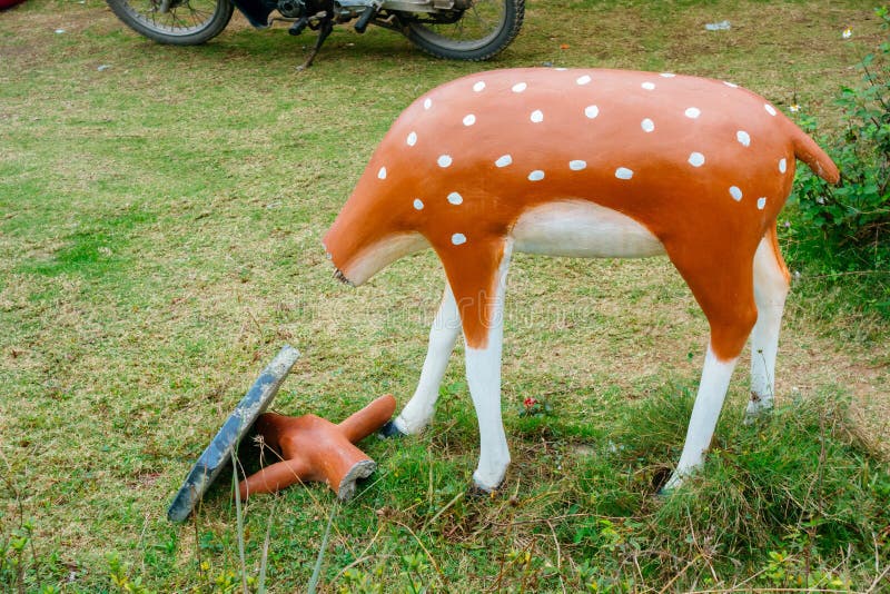 Deer Statue with Broken Head Stock Image - Image of head, vintage ...