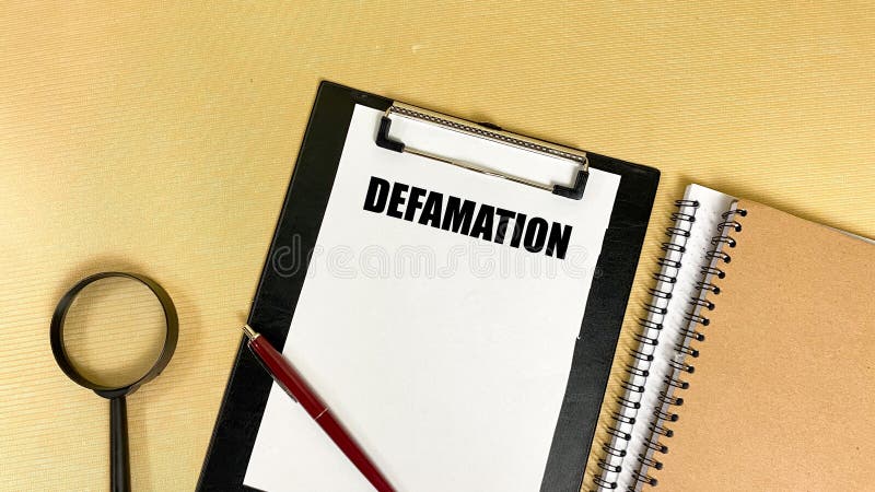 Defamation writing concept stock photo. Image of advertising - 375793442