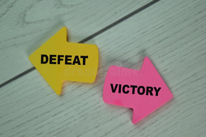 Defeat or Victory Write on Sticky Notes Isolated on Wooden Table Stock ...