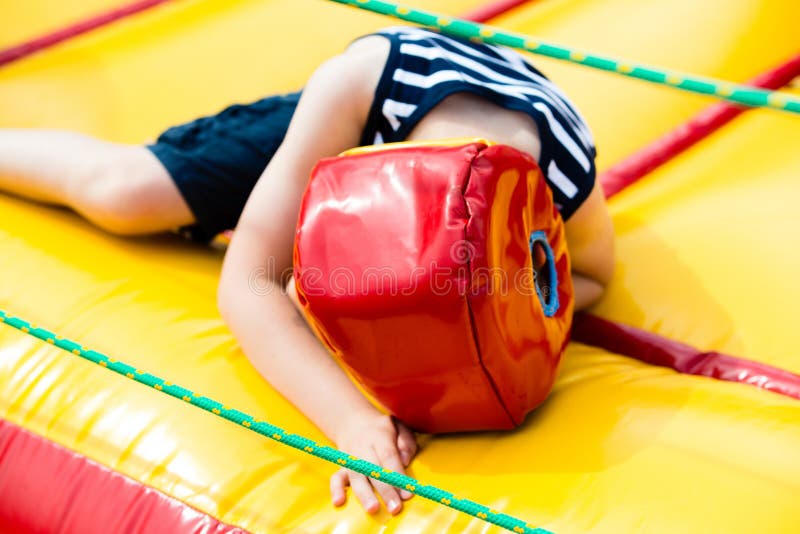 Defeated Boy Lying in a Boxing Helmet Stock Photo - Image of anger ...