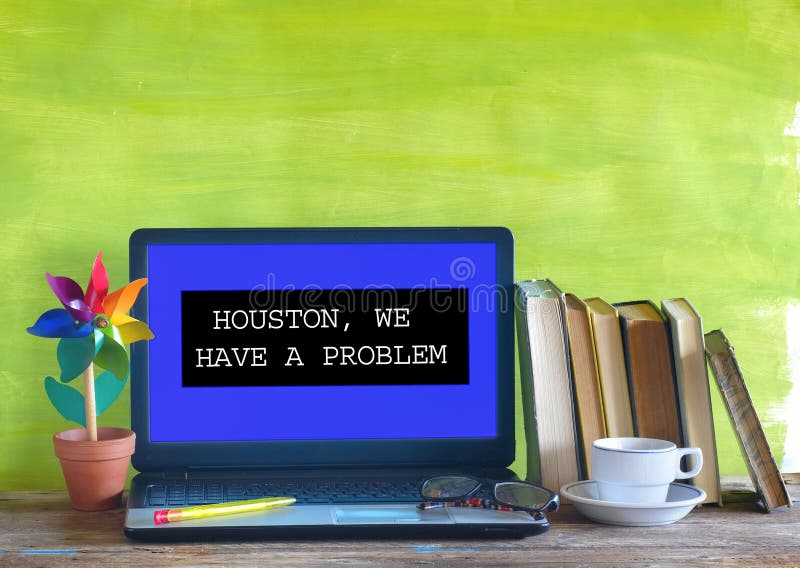 Defect Laptop Computer in Home Office, Displaying Message Houston we ...