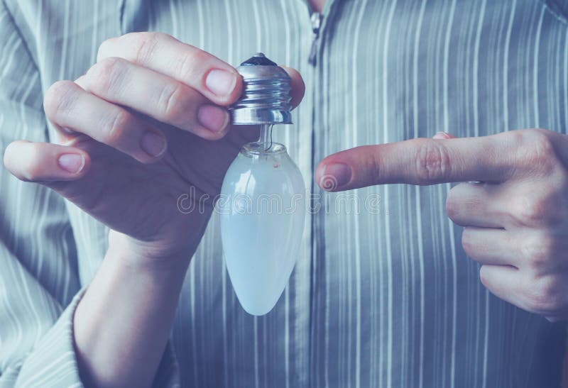 Defective Light Bulb. Broken Incandescent Light Bulb. Stock Photo ...