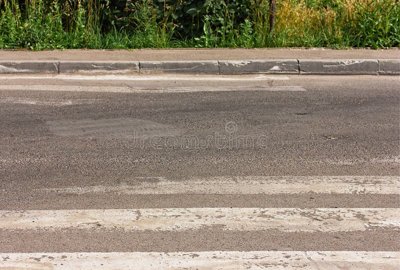 Defective Pedestrian Crossing, with Worn Out Stripes Stock Photo ...