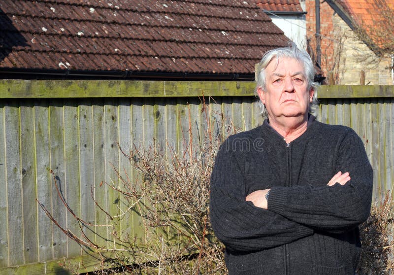 Defiant elderly man. stock photo. Image of male, crossed - 31617742