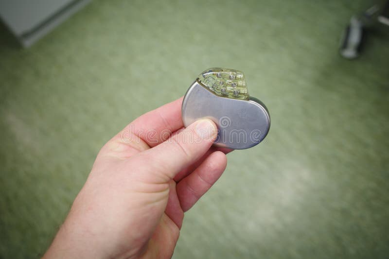 A Defibrillator is in the Hand Stock Photo - Image of bypass, medical ...