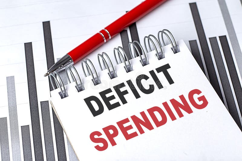 DEFICIT SPENDING Text on Notebook on Chart with Pen Stock Photo - Image ...
