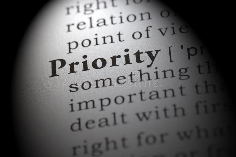 Definition of priority stock image. Image of book, word - 232348749