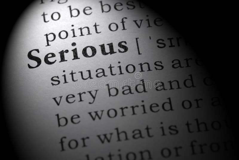 Definition of serious stock image. Image of dictionary - 215190015