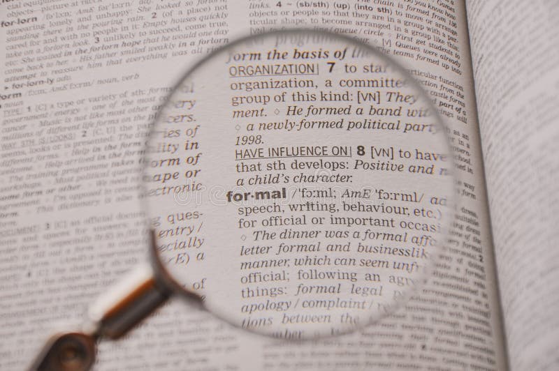 The Definition of the Word Formal in a Dictionary, Under Magnifying ...